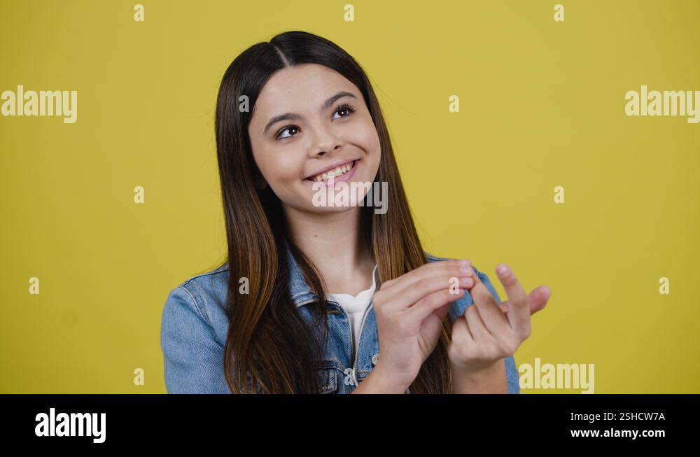 Closeup of a beautiful teen girl enumerating her plans, dreamily looking aside Stock Video ...