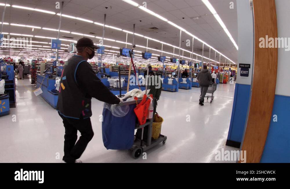 Walmart super center interior POV walking front of store people at ...