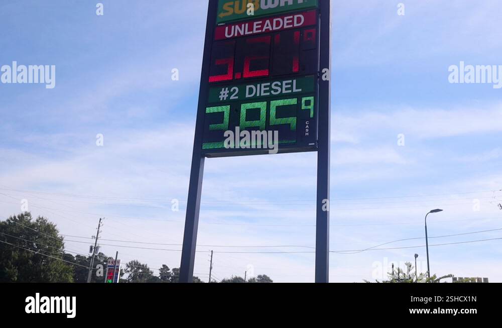 Pilot gas station and Subway street sign 3.24 a gallon tilt down to ...