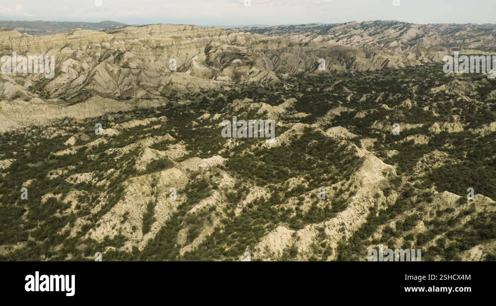 Arid canyon landscape with hills and scarce bush vegetation, Georgia ...