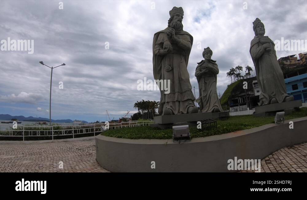 Great statues on the ocean. Three statues on the island. Attraction of ...