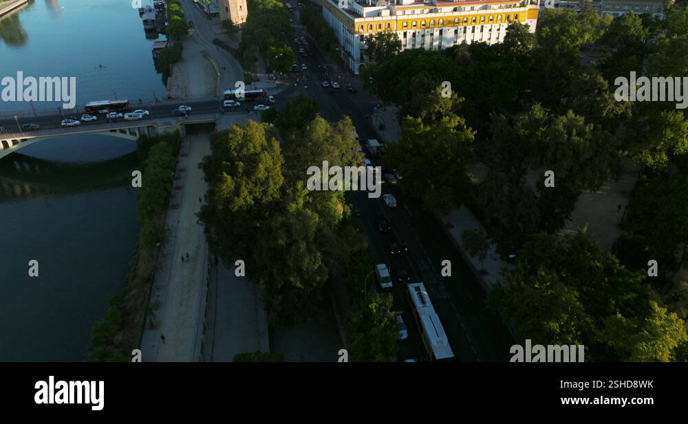 Fly Over Road Bridge Over River Guadalquivir In Seville City At Dawn In ...