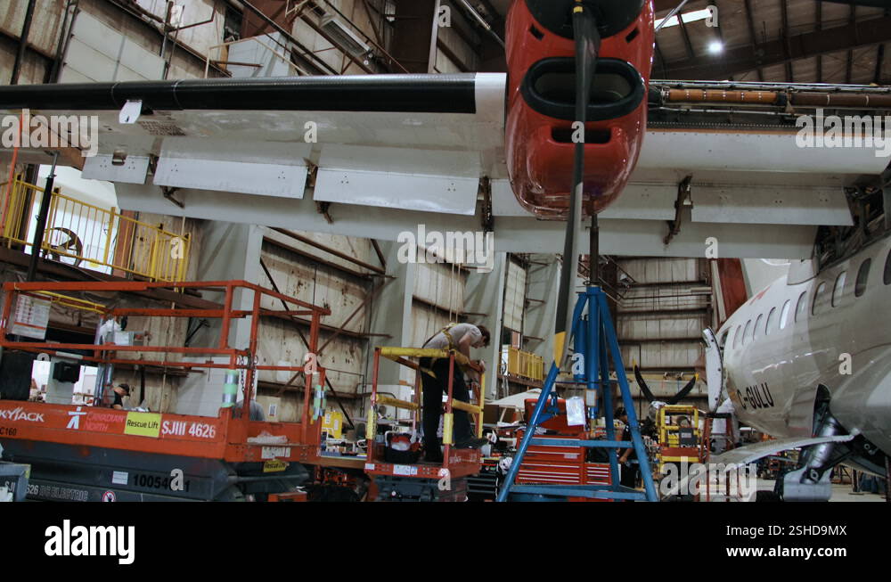 aerospace engineering inside a hangar building planes Stock Video ...