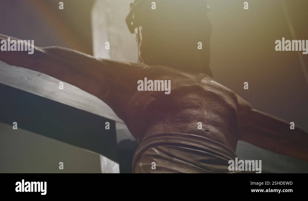 Cinematic Extreme Closeup View of Jesus Statue on the Cross, Handheld ...