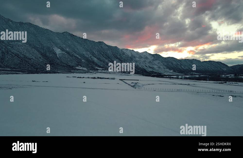 dramatic sunset aerial of mountains in colorado. Winter time Stock ...