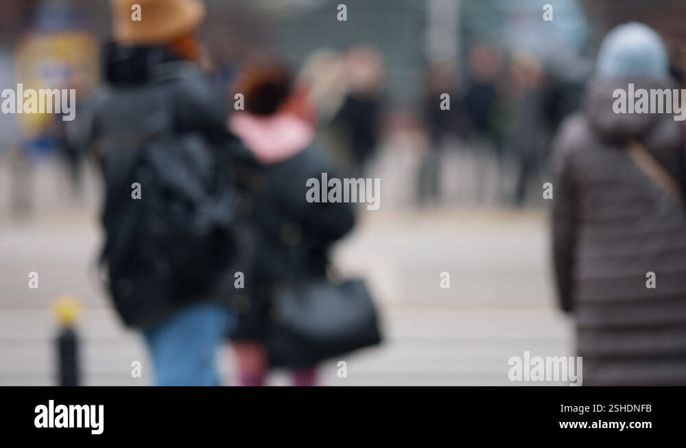 Blurred urban city cars driving crossroad slow motion. People walking ...