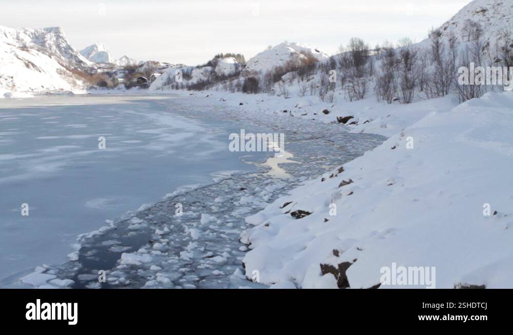 Fixed Shot Of Frozen Svolvaer Bay Covered With Snow, Lofoten, Norway ...