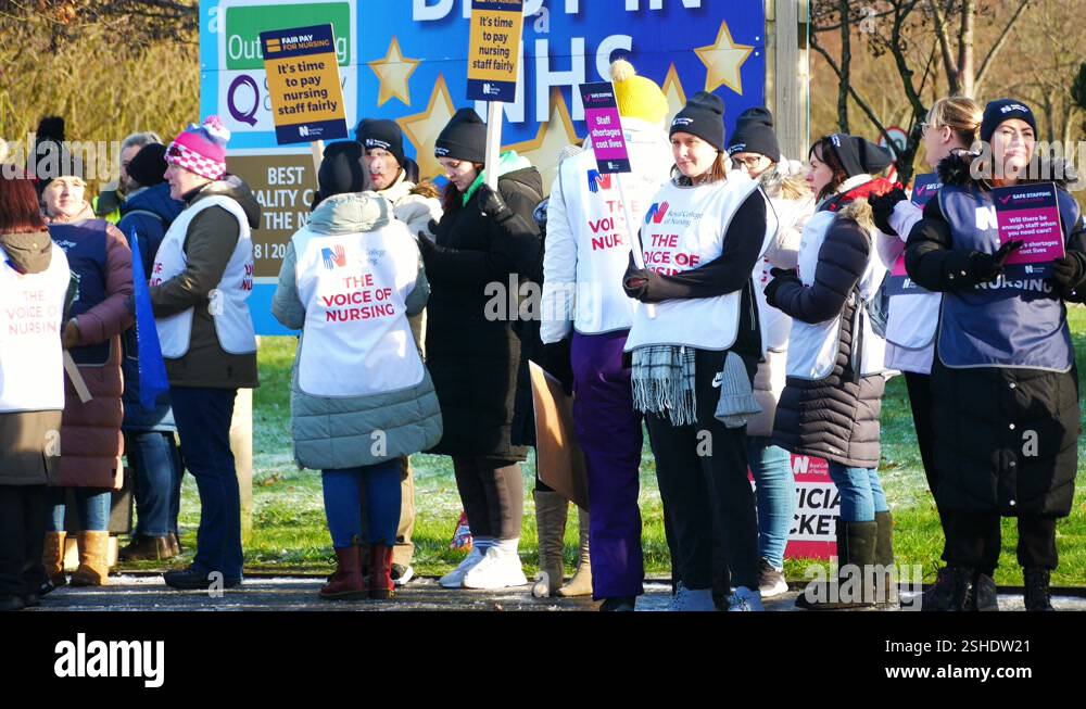 UK hospital nurses protest for fair pay, holding banners and waving ...