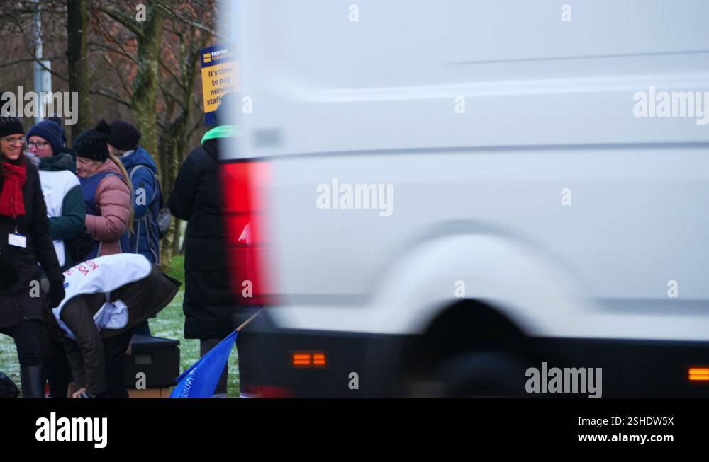 UK hospital nurses protest for fair pay, holding banners and flags on ...
