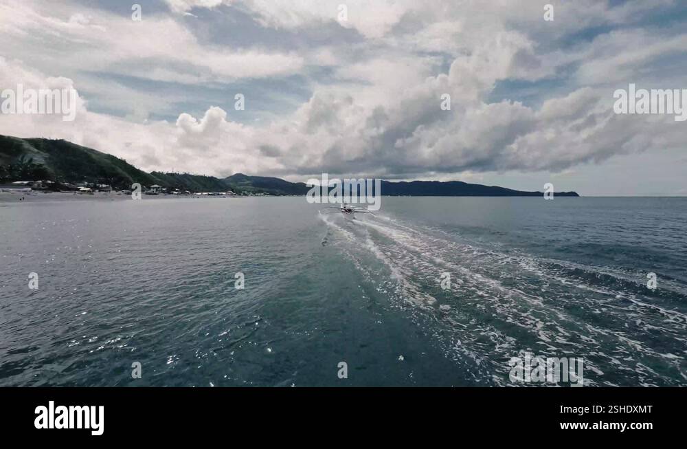 Fishing boat chase on Mabua Surigao Stock Video Footage - Alamy