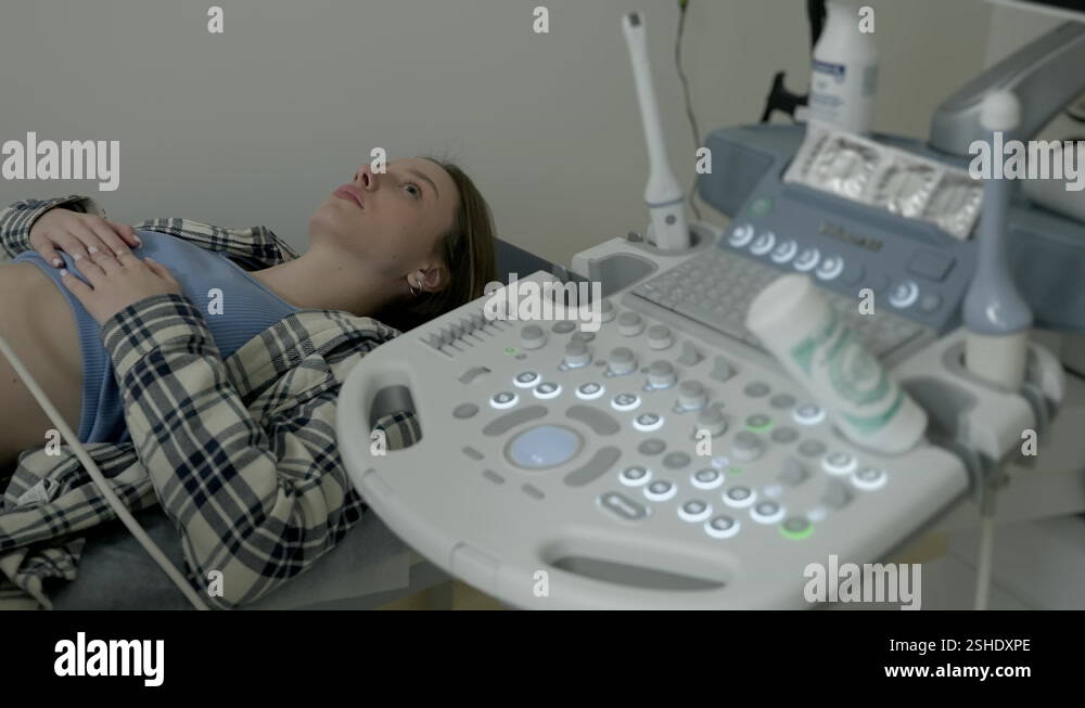 Checking child inside the woman womb during a healthcare diagnostic ...