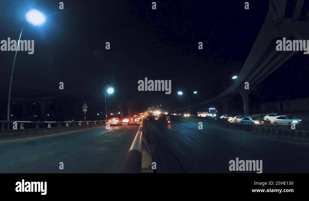 Timelaps of a busy road at night Stock Video Footage - Alamy