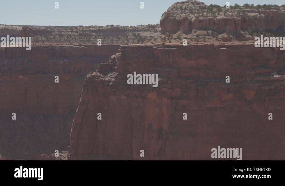 Zoom out from a tall desert cliff in central Utah. Shot in 4K Stock ...