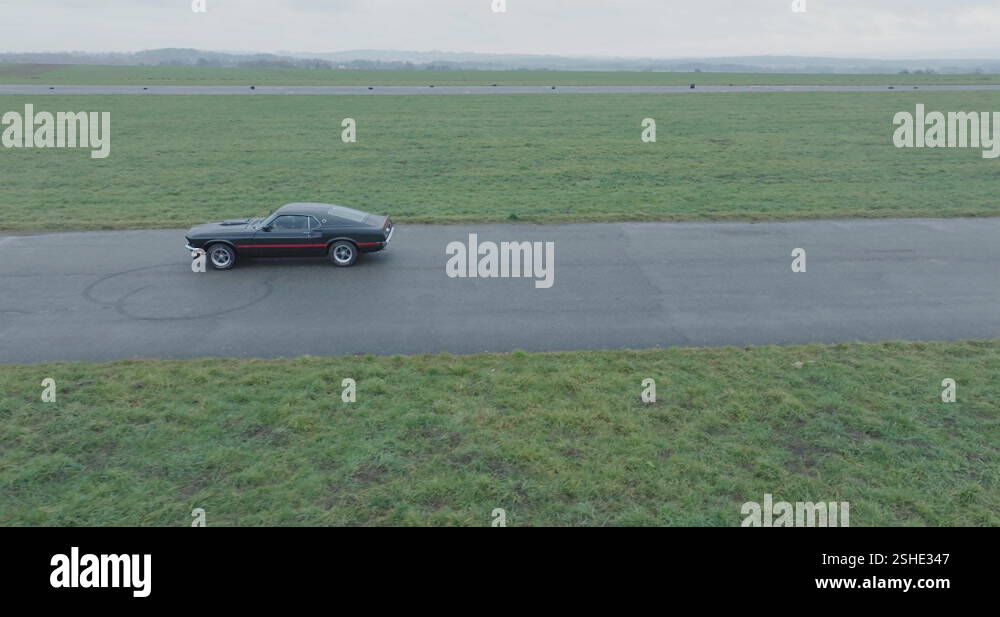 Aerial View of Ford Mustang Mach 1, Classic Sports Car on the Road ...
