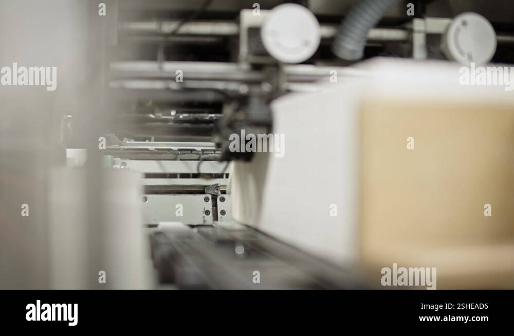 Close up shot of inside of a printing machine, closing and opening ...