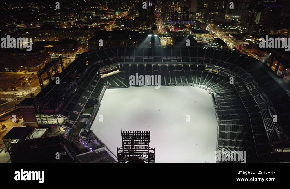 Snow-Covered Baseball Stadium At Night In Downtown Urban Area. 4K ...