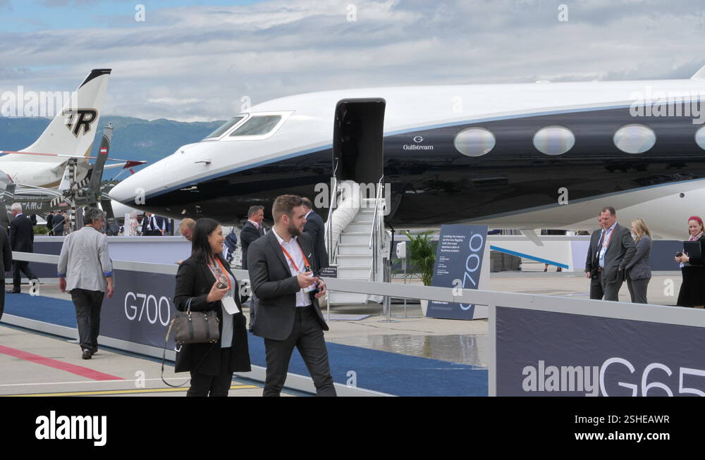 Attendees of EBACE look at Gulfstream G700 business aircraft at apron ...