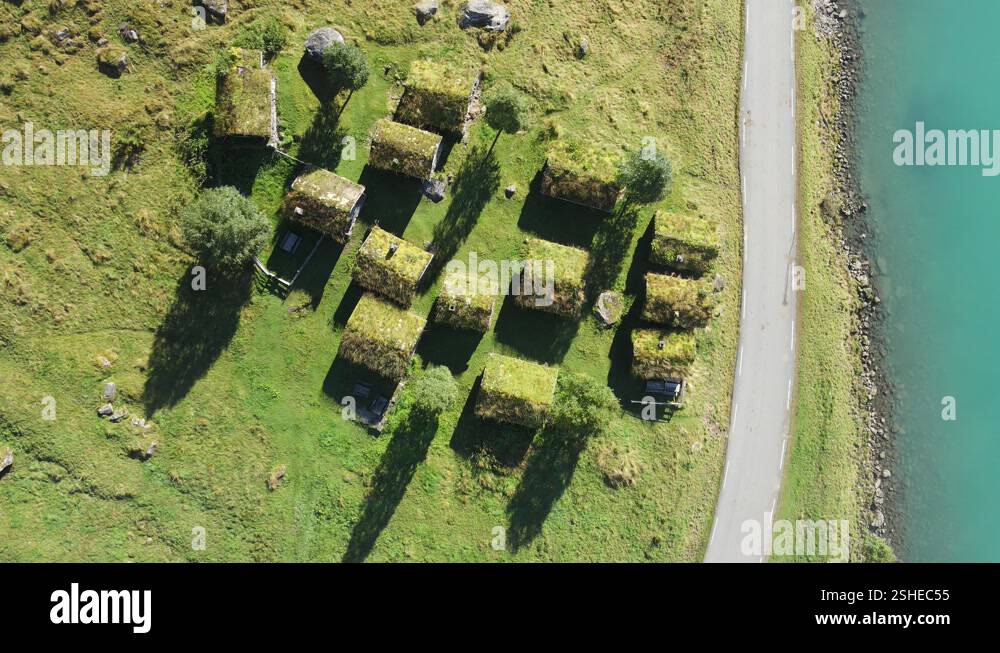 Breng seter historical farm houses on the bank of Lovatnet glacier lake ...