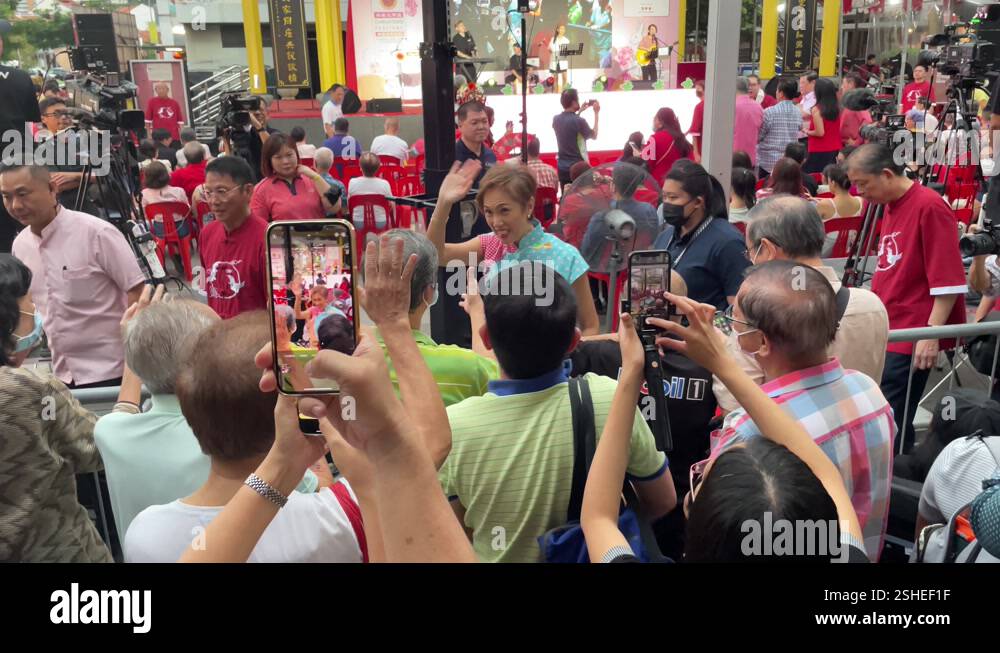 People welcome the arrival of Singapore Second Minister Josephine Teo ...