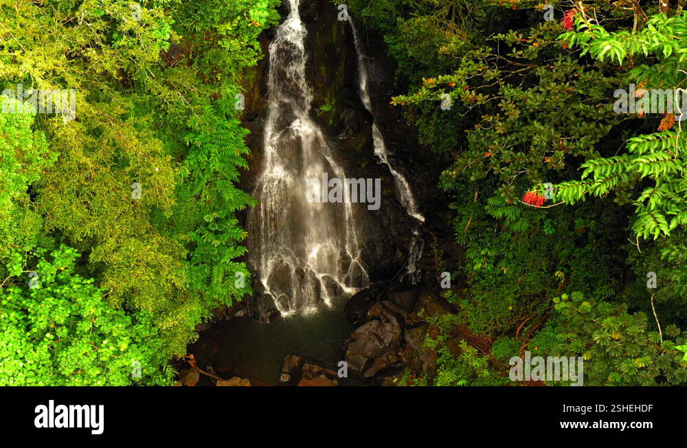 Aerial: Drone Tilt Down Beautiful View Of Waterfall On Rock Formations ...