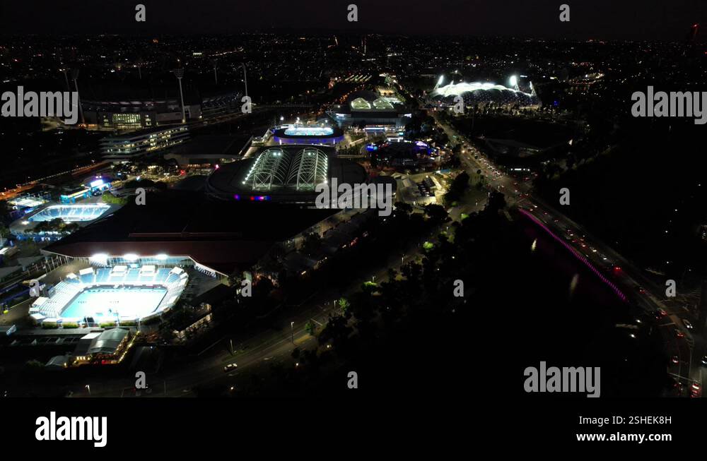 Melbourne sporting precinct aerial multiple sporting stadiums night ...