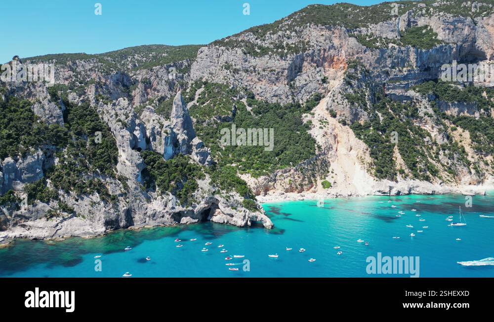 Tourist Boats Enjoy Summer Vacation at Cala Goloritze Beach and Rock ...
