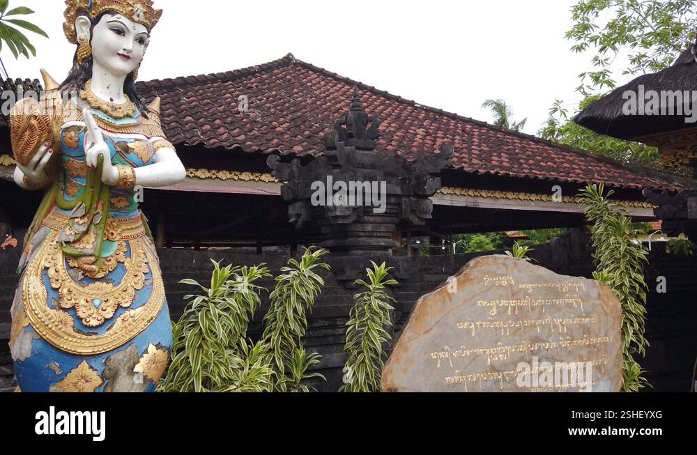 Balinese Female Deity Statue in the Entrance of Sukawati Bali Temple ...