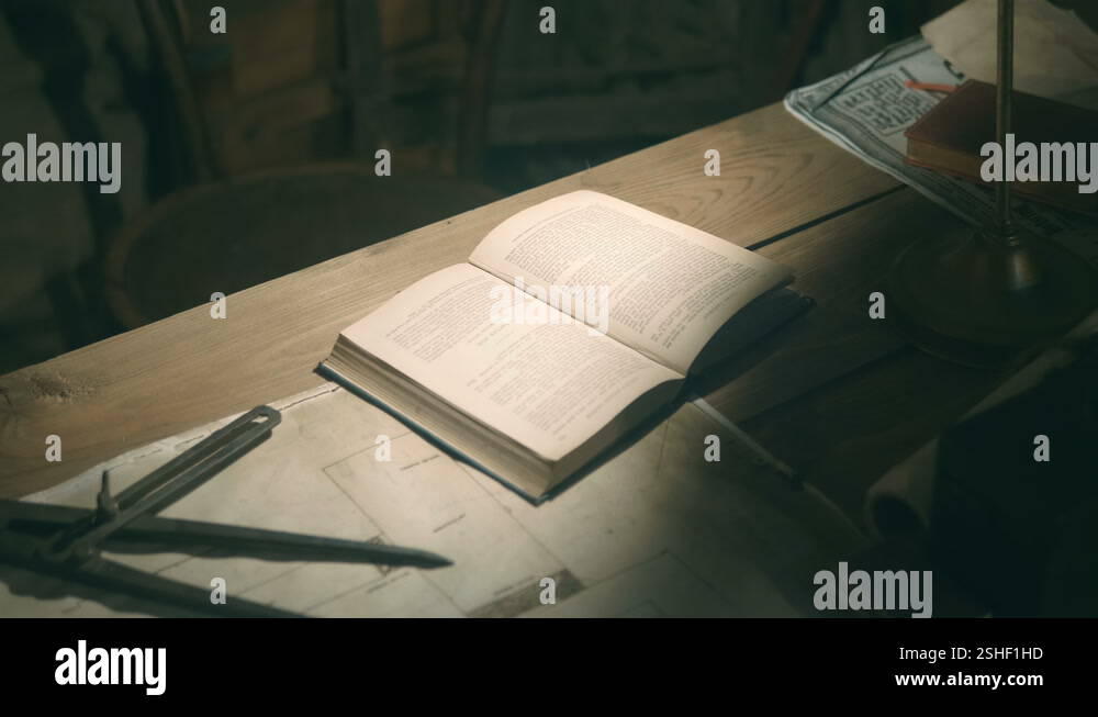 In the twilight, the table of an ancient archaeologist, explorer ...