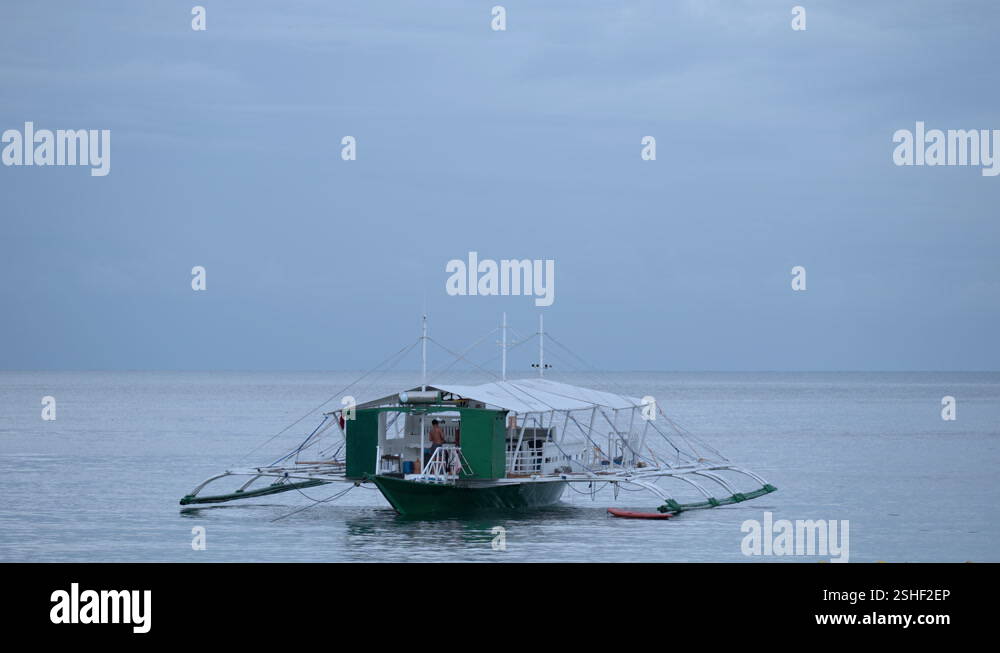 Huge Outrigger Boat Floating On The Ocean At The Island Of Mactan In ...