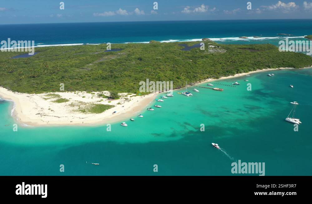 Aerial Drone view of a boats near a tropical caribbean island. In Cayo ...