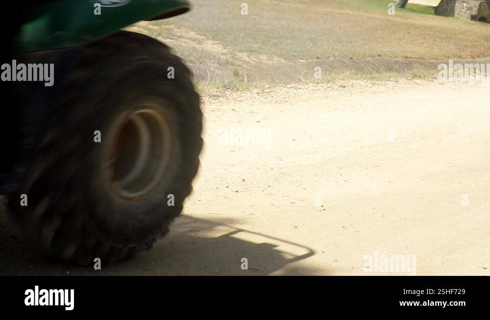 4x4 quad ride on path moving towards camera, Shot stabilized Stock ...