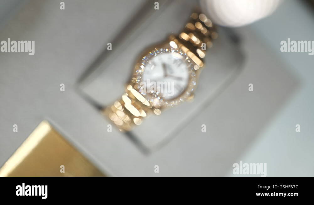 VERTICAL Luxury Chopard gold Swiss watch set with expensive shimmering ...