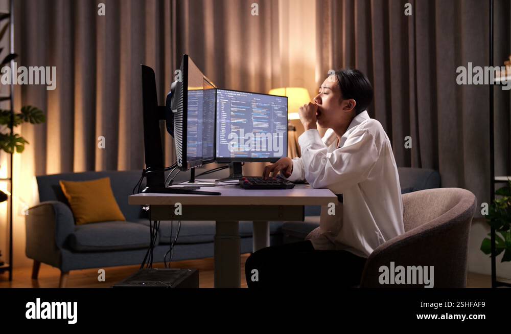Asian Woman Programmer Yawning And Sleeping While Creating Innovative Stock Video Footage - Alamy