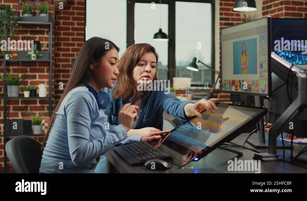 Female content creators editing professional images with retouching ...