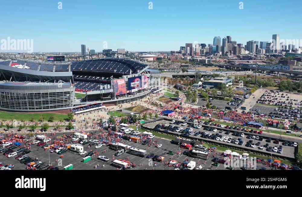 Cinematic aerial shot of iconic Empower field at Mile High Stadium with ...