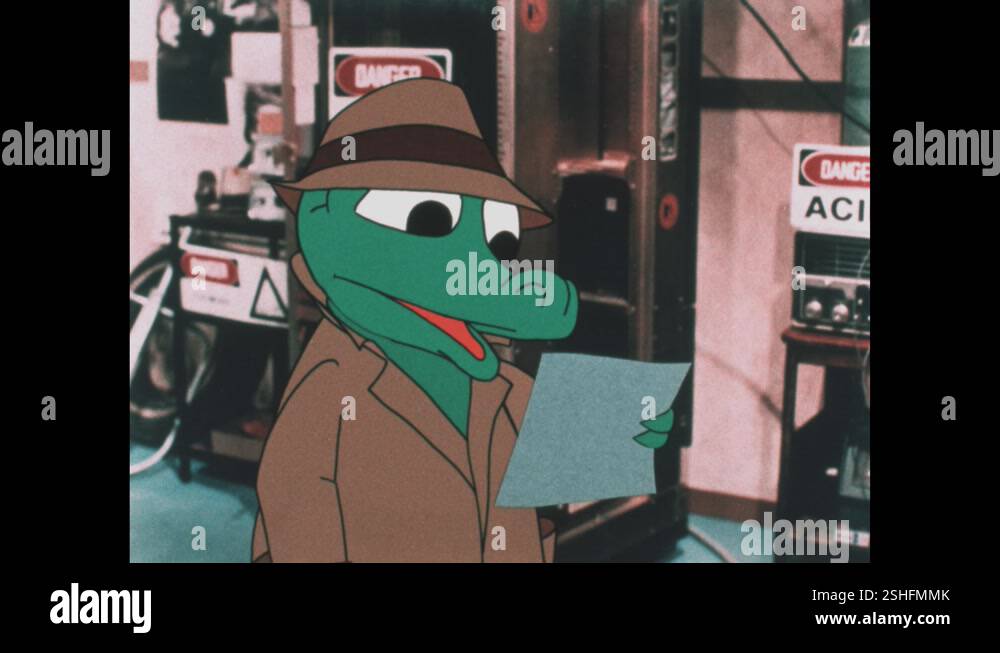 1990s: Animated hand holding paper, zoom in. Animated lizard reading ...