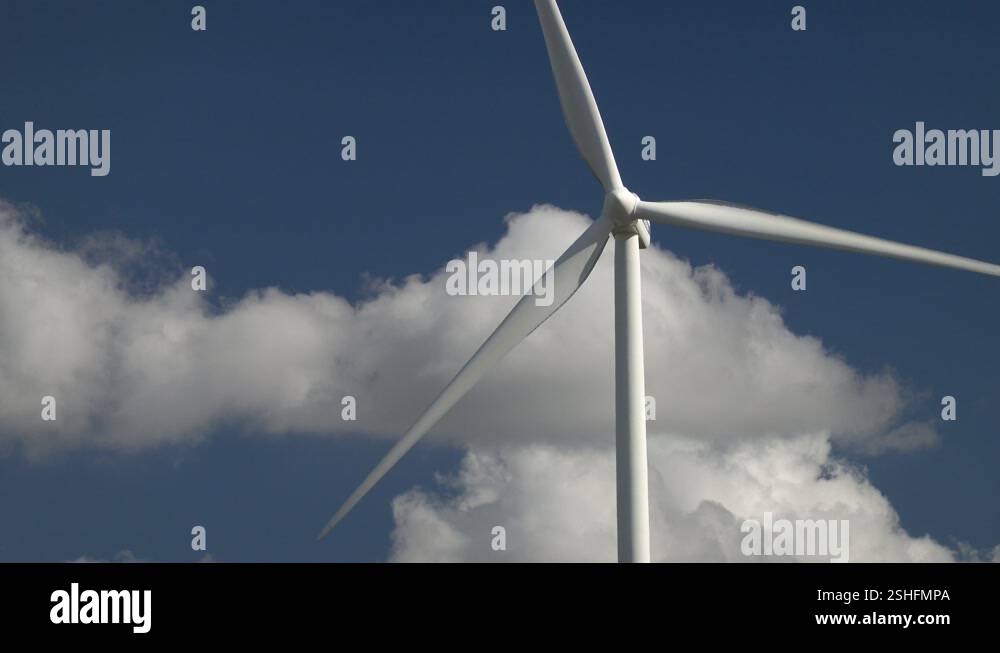 A wind farm in Cyprus. Close up of the turbine blades working Stock ...