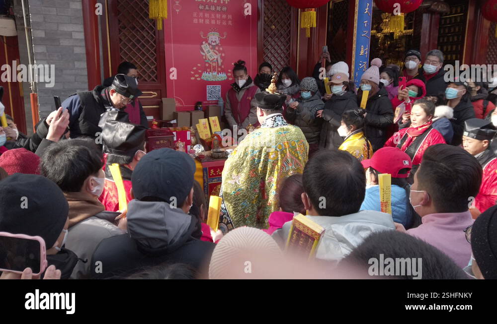 Crowd of People praying for good fortune in Fire God Taoism Temple ...