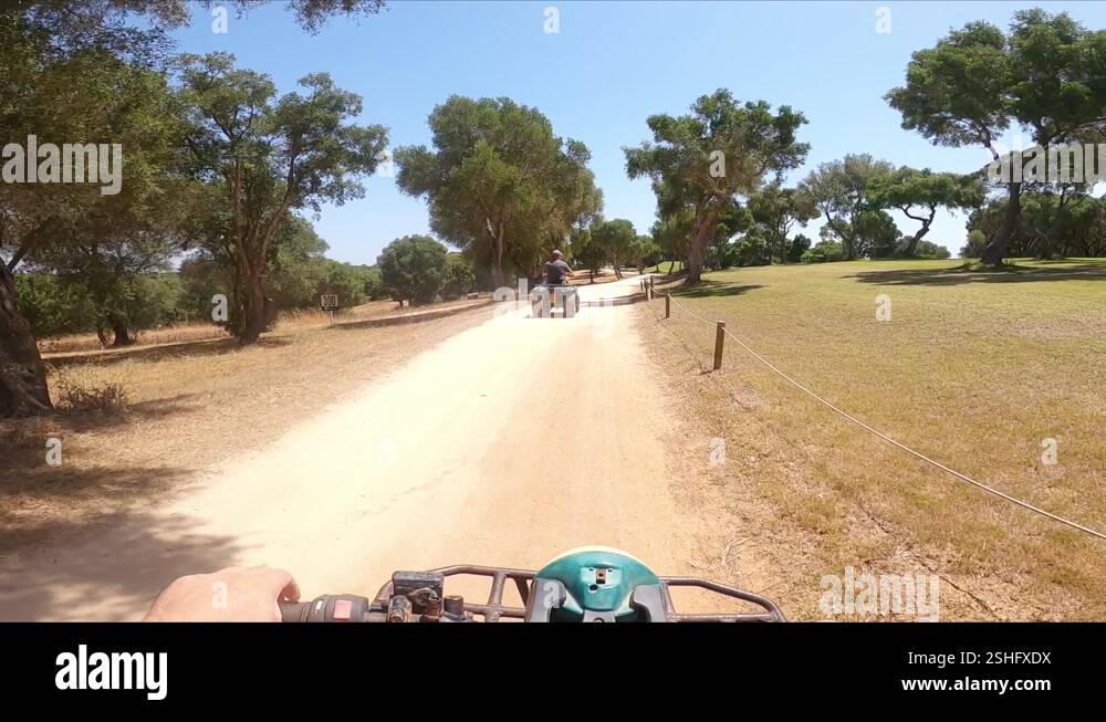 4x4 quad ride on path moving towards camera. Shot stabilized Stock ...