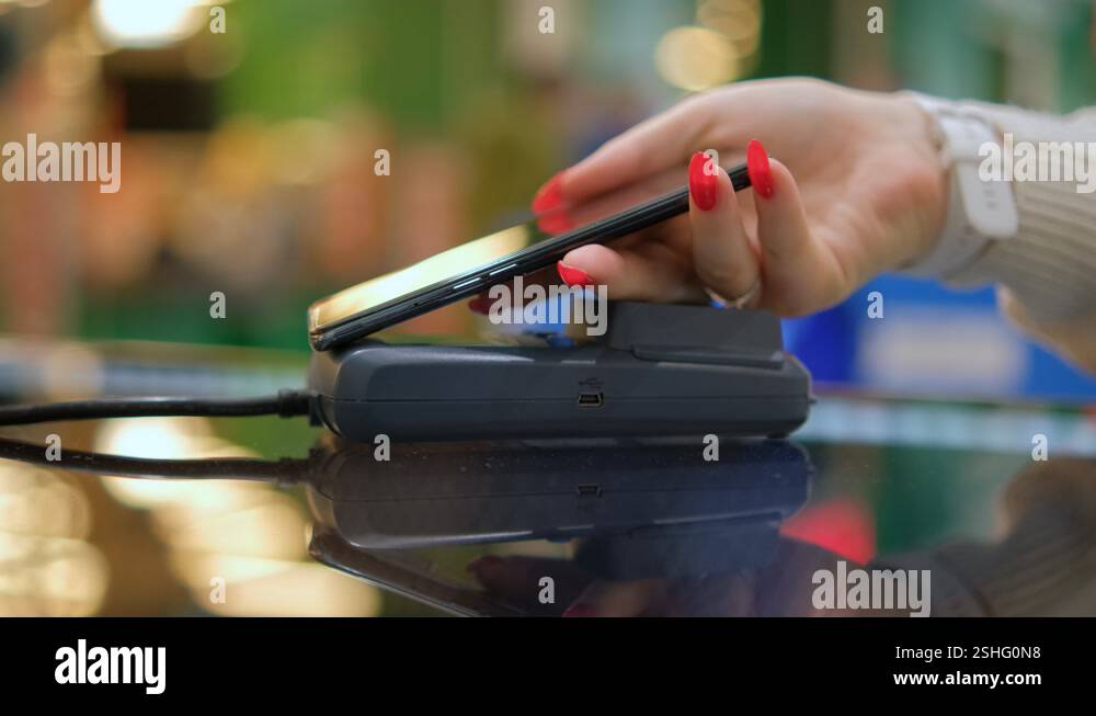 Pay by phone on electronic payment machine or card reader. E-money at ...