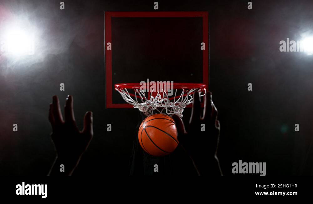 Super slow motion of basketball player hitting the basket Stock Video ...