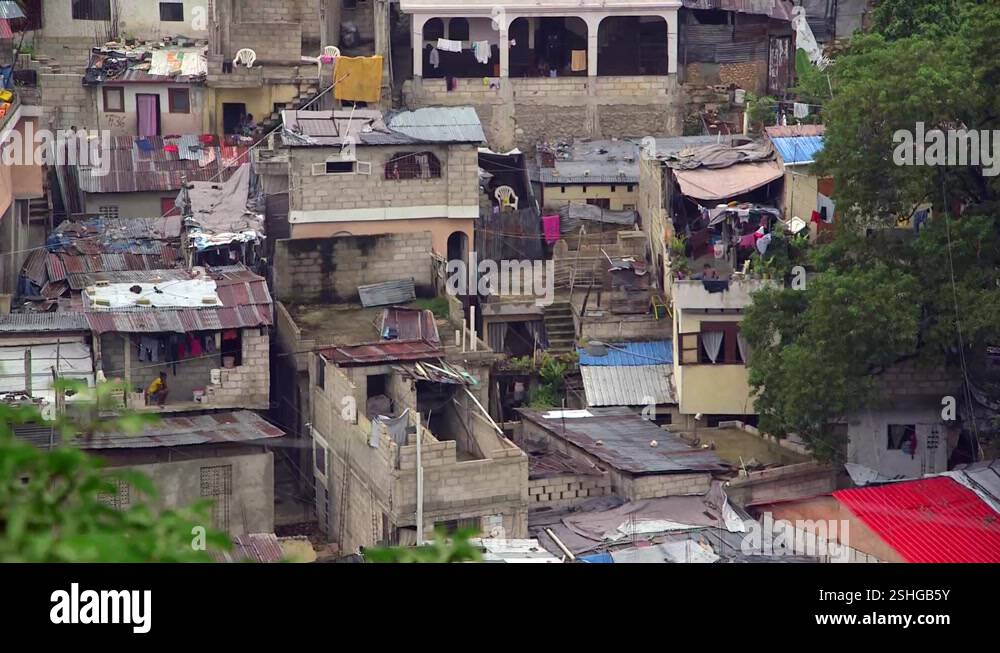 Port au Prince slum. Tilt up reveals crowded shanty town in Haiti Stock ...