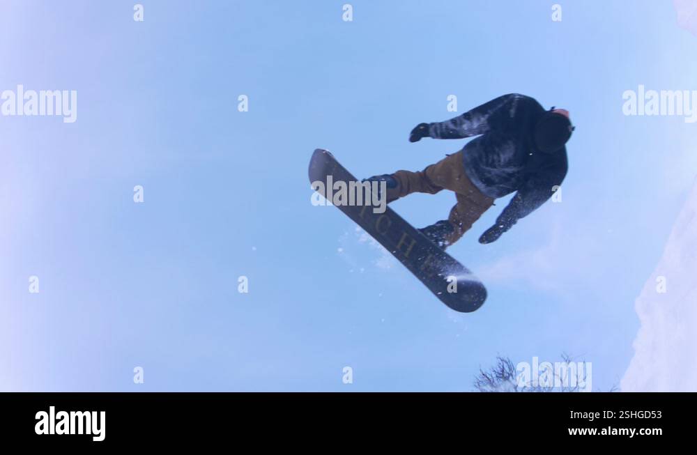120 fps of snowboarder effortlessly doing a backflip over camera ...