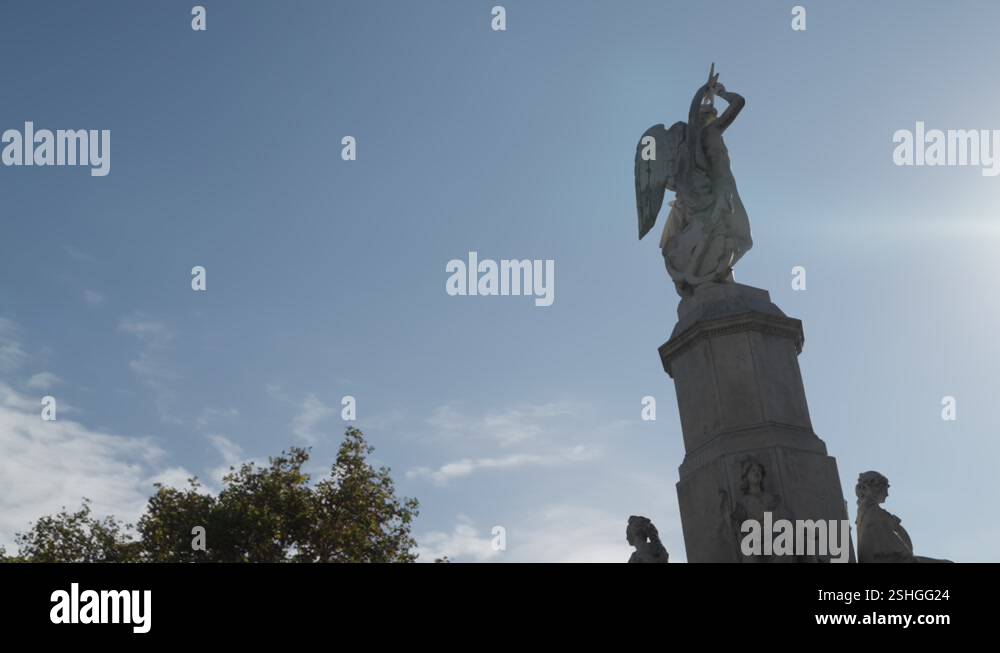 Antique marble landmark statue in Barcelona city with bright sunshine ...