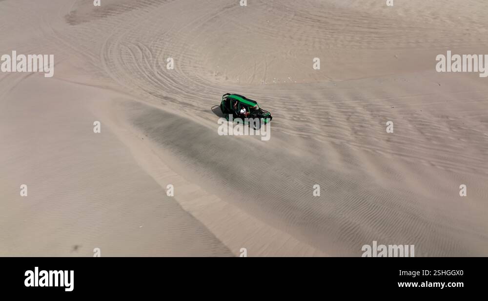 Dune buggies in Huacachina, Peru desert. Fast sand buggy driving on the ...