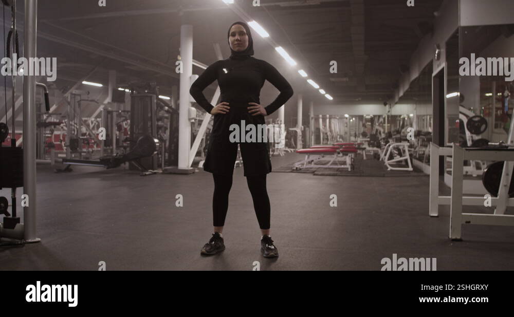 Strong Muslim athlete in spacious gym Stock Video Footage - Alamy