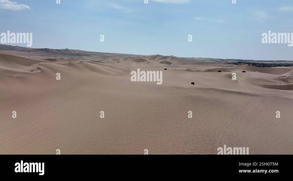 Dune buggies in Huacachina, Peru desert. Fast sand buggy driving on the ...