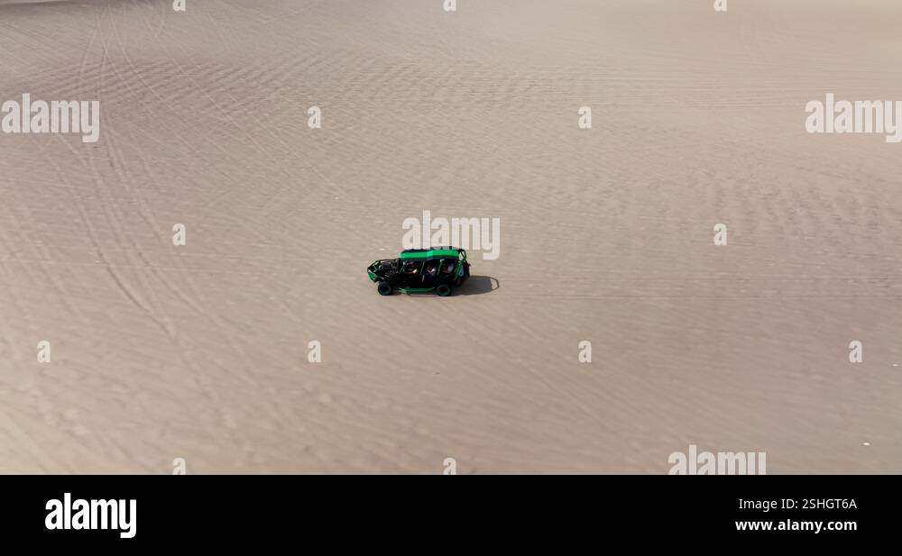 Dune buggies in Huacachina, Peru desert. Fast sand buggy driving on the ...