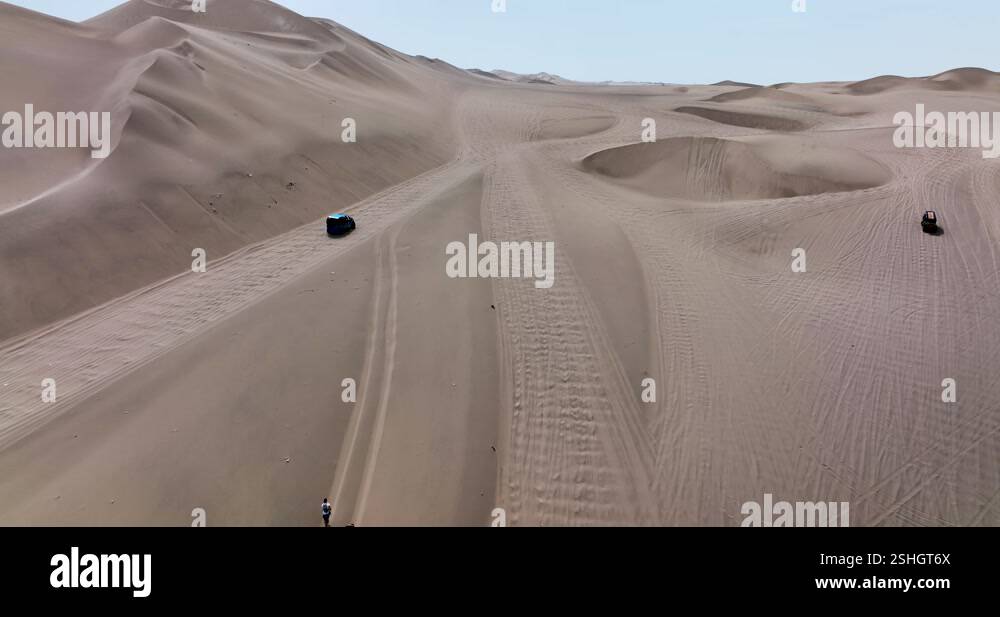 Dune buggies in Huacachina, Peru desert. Fast sand buggy driving on the ...