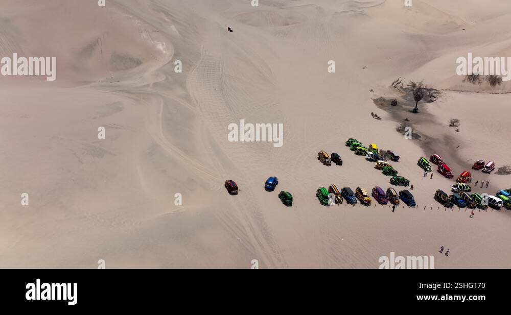 Dune buggies in Huacachina, Peru desert. Fast sand buggy driving on the ...